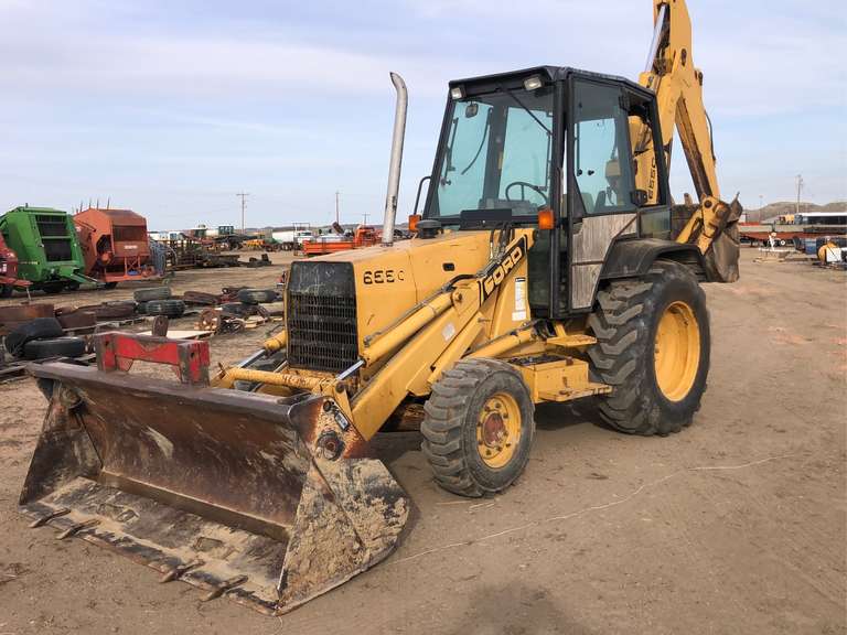 Ford 655 Backhoe - Smith Sales Co. Auctioneers