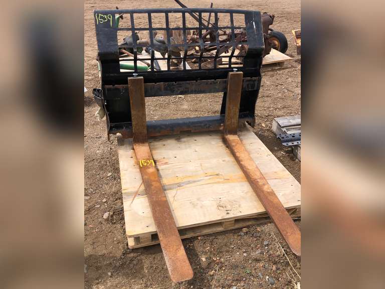 Skid Steer Forks / damaged - Smith Sales Co. Auctioneers