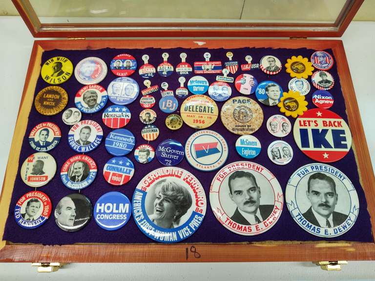 Lot of 53 vintage campaign buttons in showcase - South Auction
