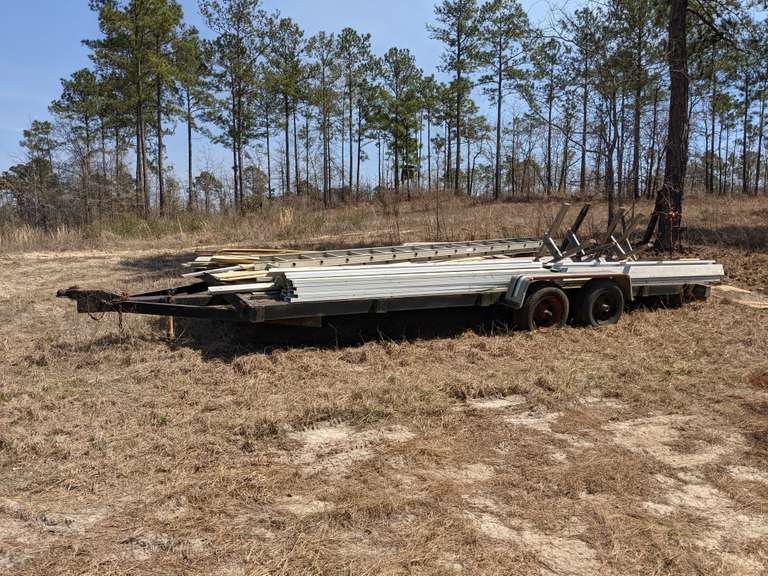 16-ft custom-made metal trailer with scrap metal on top - South Auction