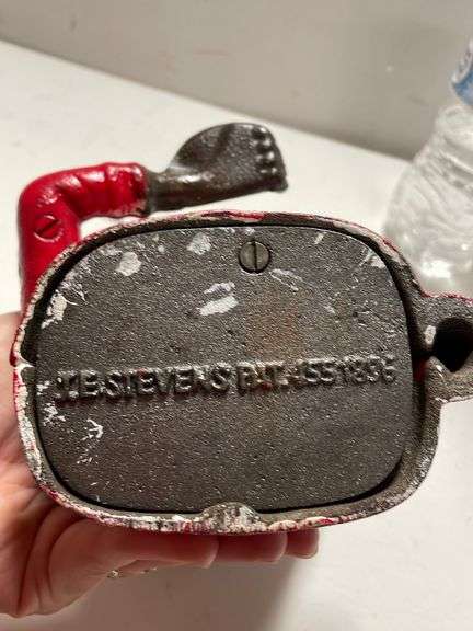 J.E. Stevens Cast Iron Jolly Nigger Mechanical Coin Bank - Trice Auctions