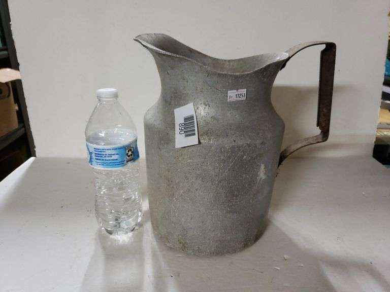 Antique Metal Milk Pitcher - Trice Auctions