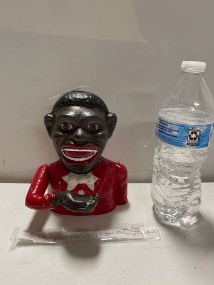 J.E. Stevens Cast Iron Jolly Nigger Mechanical Coin Bank - Trice Auctions