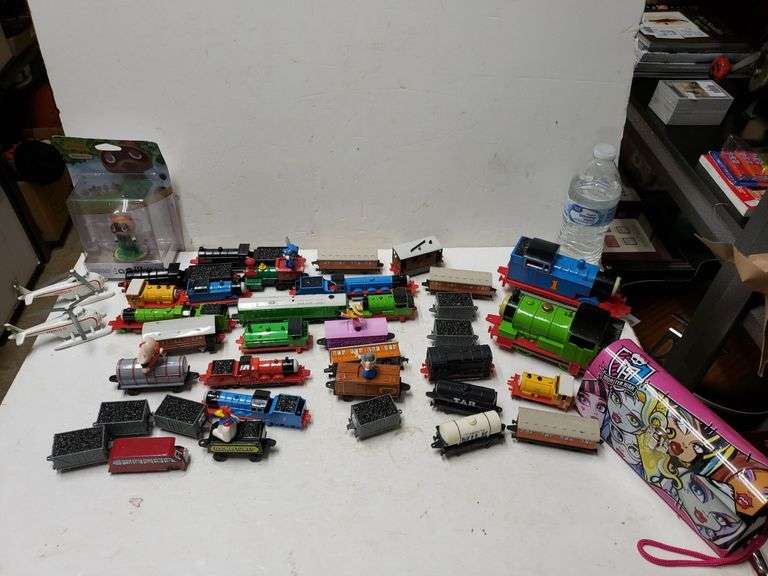 Assortment Of Toy Train Cars To Include Thomas The Train, Looney Tunes, Helicopters, Monster ...