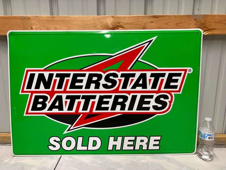 Interstate Batteries Sold Here Metal Sign - Trice Auctions