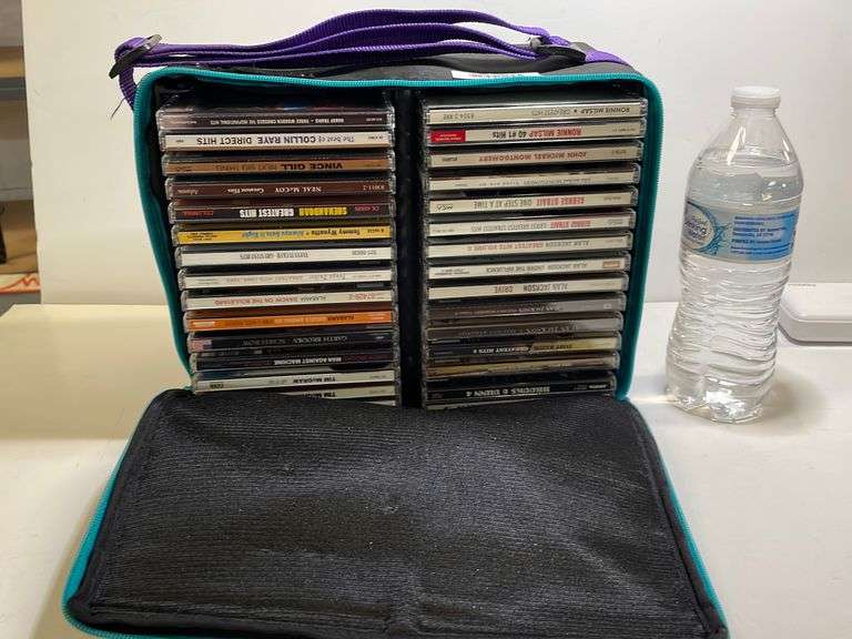 Country Music CDs in Carrying Case - Trice Auctions
