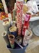 Trash Can With Christmas Wrapping Paper - Trice Auctions