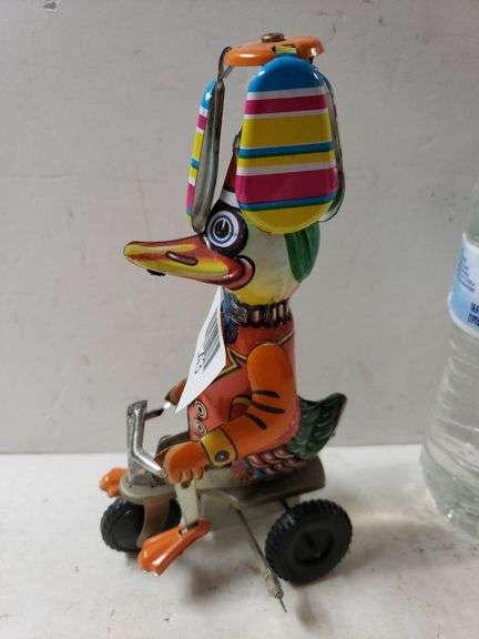 Vintage Metal Wind-Up Duck Tricycle Toy - Trice Auctions