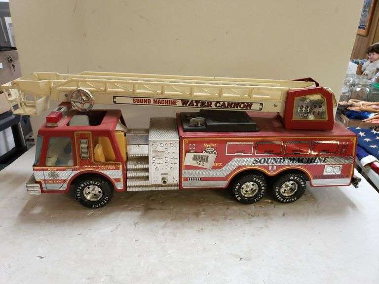 Nylint Sound Machine Ladder Fire Truck - Trice Auctions