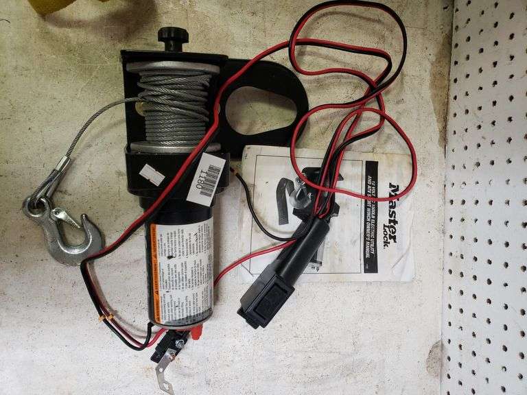 Master Lock 12 Volt 1500 lb Utility Winch- Works Like New - Trice Auctions