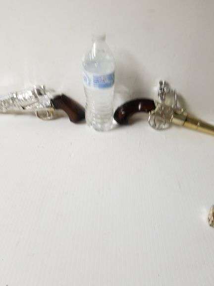 Avon Gun Decanters - Trice Auctions