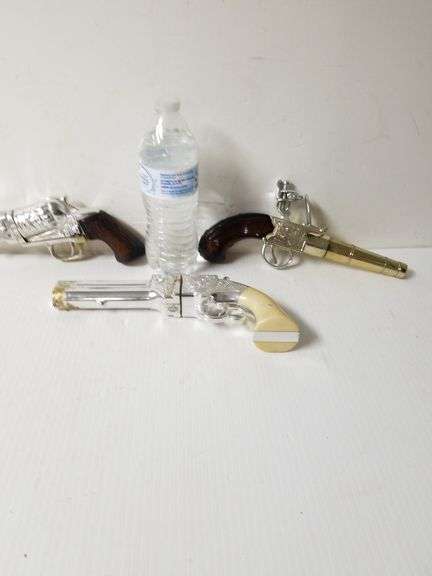 Avon Gun Decanters - Trice Auctions