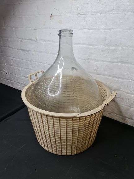 25L Glass Wine Demijohn in Basket - Tullochs Auctions