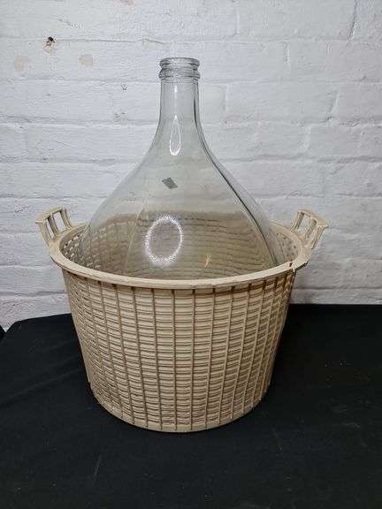 25L Glass Wine Demijohn in Basket - Tullochs Auctions