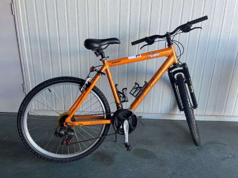 Orange Geared Push Bike - TVAA Pty Ltd T/A Tomkins Valuers & Auctioneers