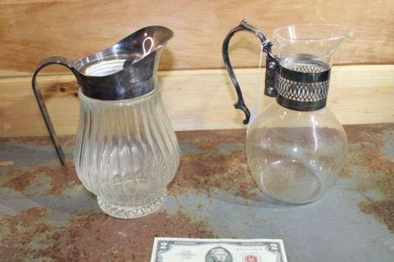 Lot of 2 pretty vintage glass pitchers with metal details and handles ...