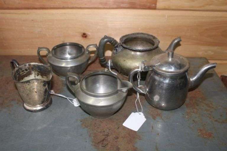 Vintage lot of metal dishware featuring pewter and silver plate teapots ...