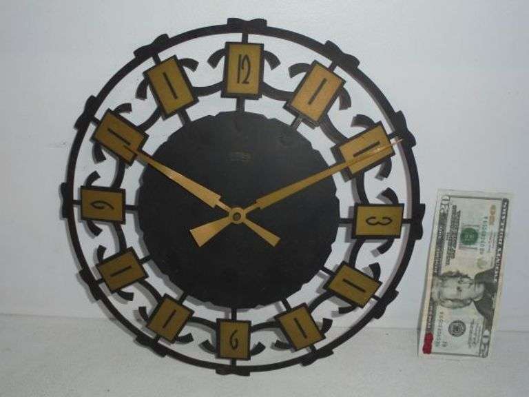 Midcentury battery operated EMES metal clock. - Texas Online Auction House