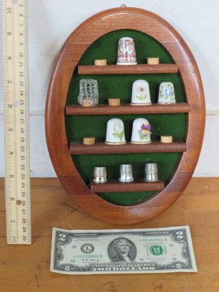 Nine Collectible Thimbles and Display Rack as shown, top thimble marked ...