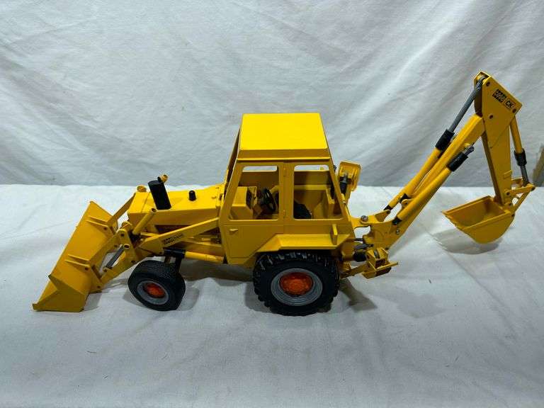 Case 580B Backhoe by NZG - United Edge Real Estate & Auction