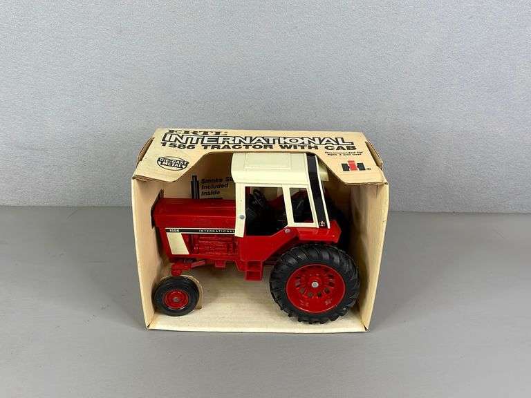 International 1586 Tractor W/Cab, 1/16 Scale, Ertl - United Edge Real Estate & Auction