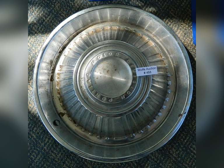 Vintage Pontiac Hubcaps - Wolfe Auction & Realty, LLC