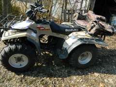 Suzuki Quad Runner 4WD ATV - Wolfe Auction & Realty, LLC