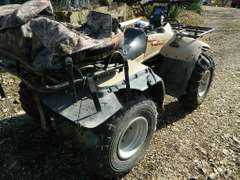 Suzuki Quad Runner 4WD ATV - Wolfe Auction & Realty, LLC