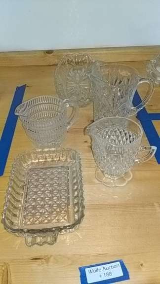 Assorted glass pitchers and butter dishes - Wolfe Auction & Realty, LLC