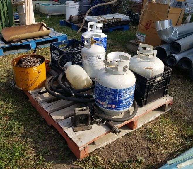 4 PROPANE TANKS, 2 BUCKETS OF CHAIN, HAD FUEL PUMP, FULE HOSE W/ NOZZLE ...