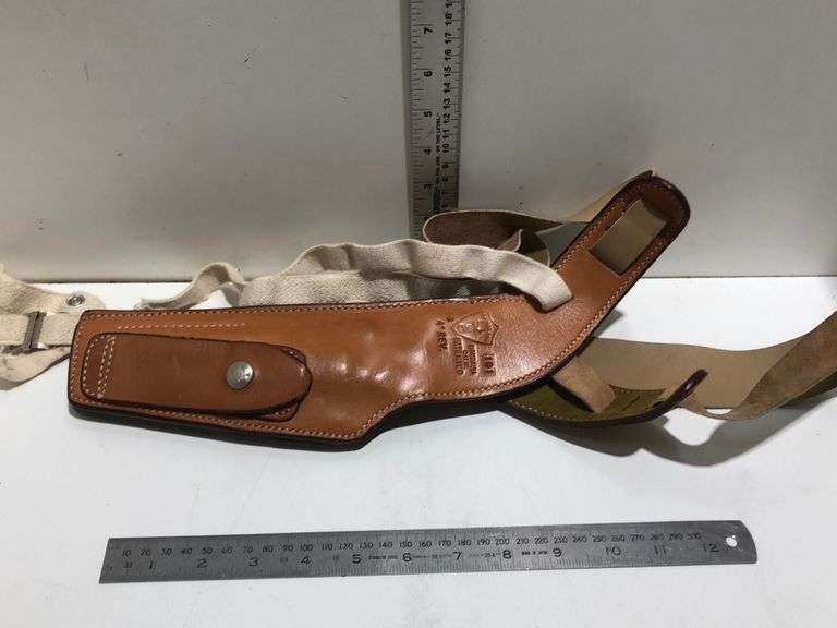 LEATHER GUN HOLSTER - Wild Rose Auction Services