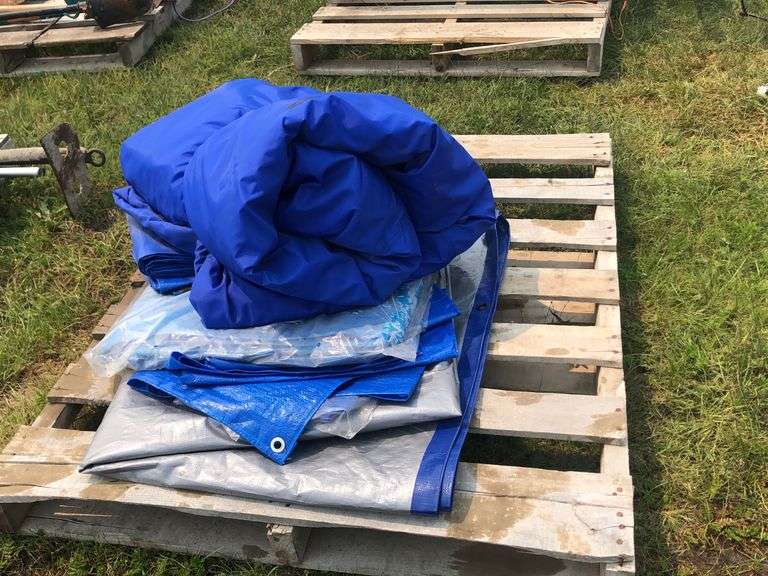 FIVE STANDARD BLUE TARPS (Assorted sizes, approx. 15' x 20') AND ONE ...