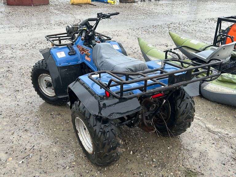 SUZUKI QUADRUNNER 4WD - Wild Rose Auction Services