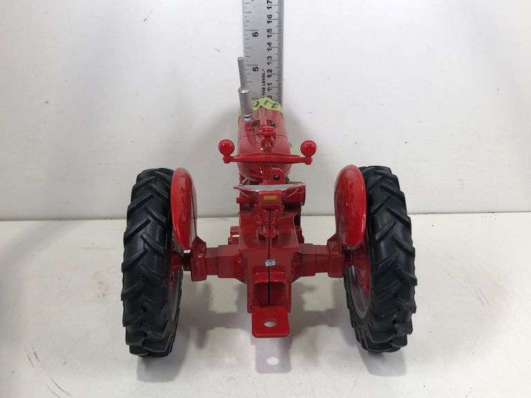 MCCORMICK FARMALL TOY TRACTOR, ONE WHEEL MISSING, Approx. 9"X5.5"X5.5 ...