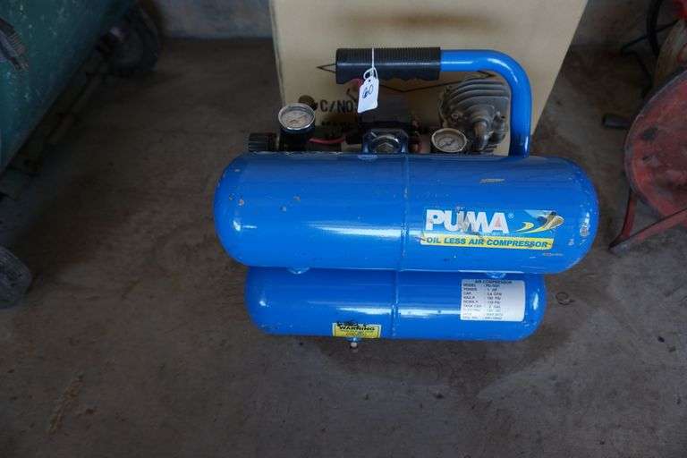 Small Puma air compressor - World Wide Auction Inc