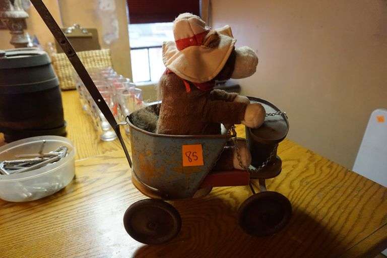 Antique metal doll stroller - World Wide Auction Inc
