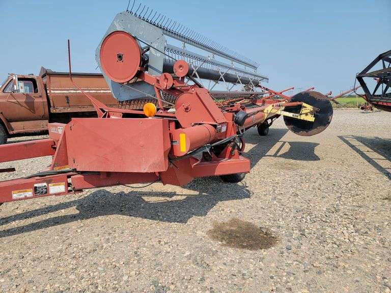 Case 8230 Pull Type Swather - Yorkton Auction Centre