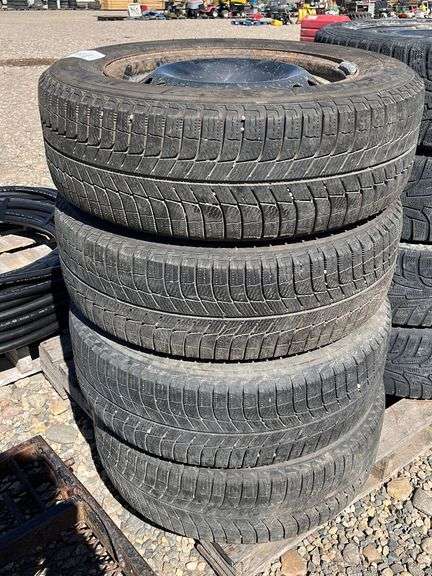 4 - 215/60R16 Hyundai Rims and Tires - Yorkton Auction Centre