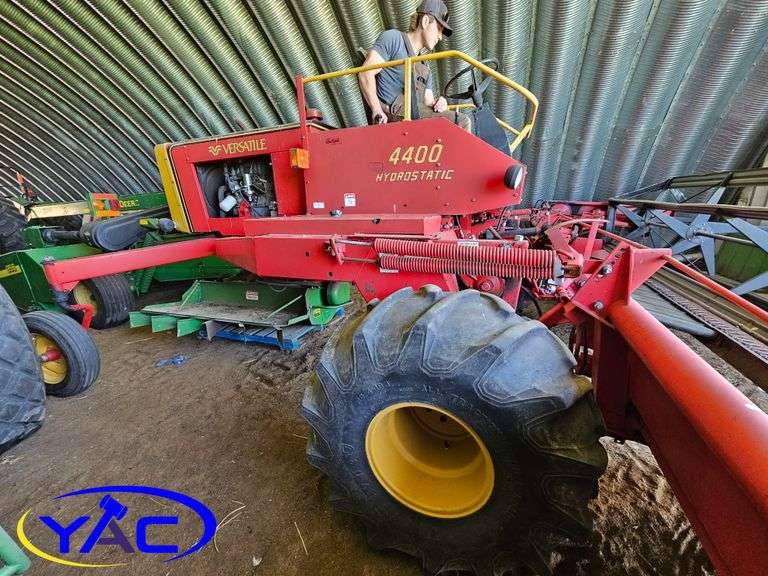Versatile 4400 Swather 25' - Yorkton Auction Centre